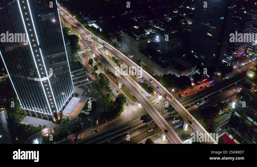 Vehicles Driving On Flyover At Night In Kuningan City, Jakarta ...
