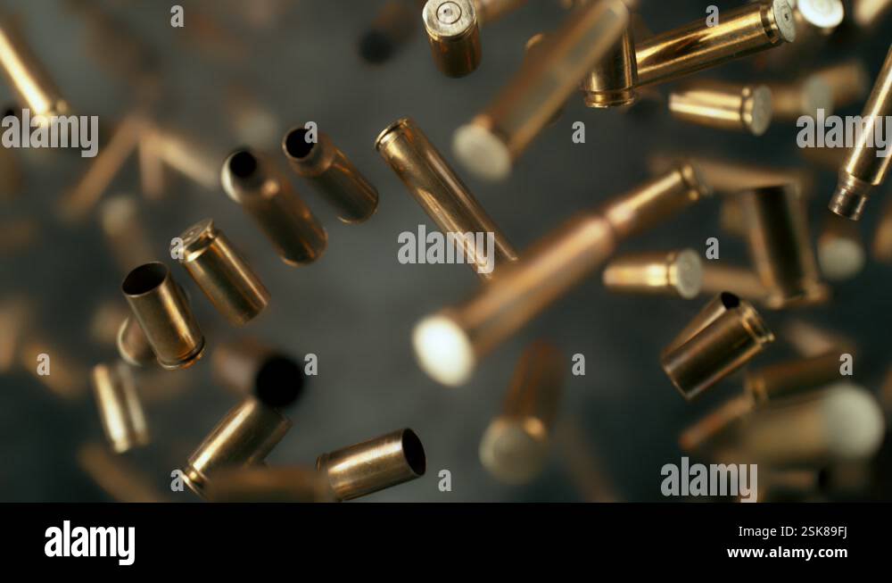 Super Slow Motion Shot of Used Real Gun Bullets Flying Towards Camera ...