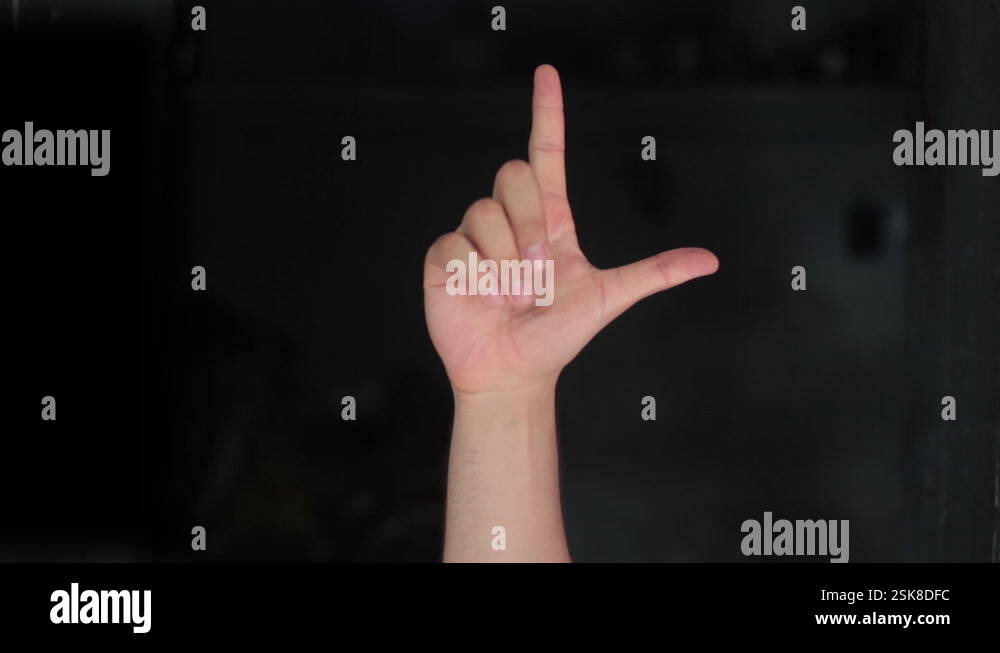 American Sign Language (ASL) single-handed Ll letter sign Stock Video ...