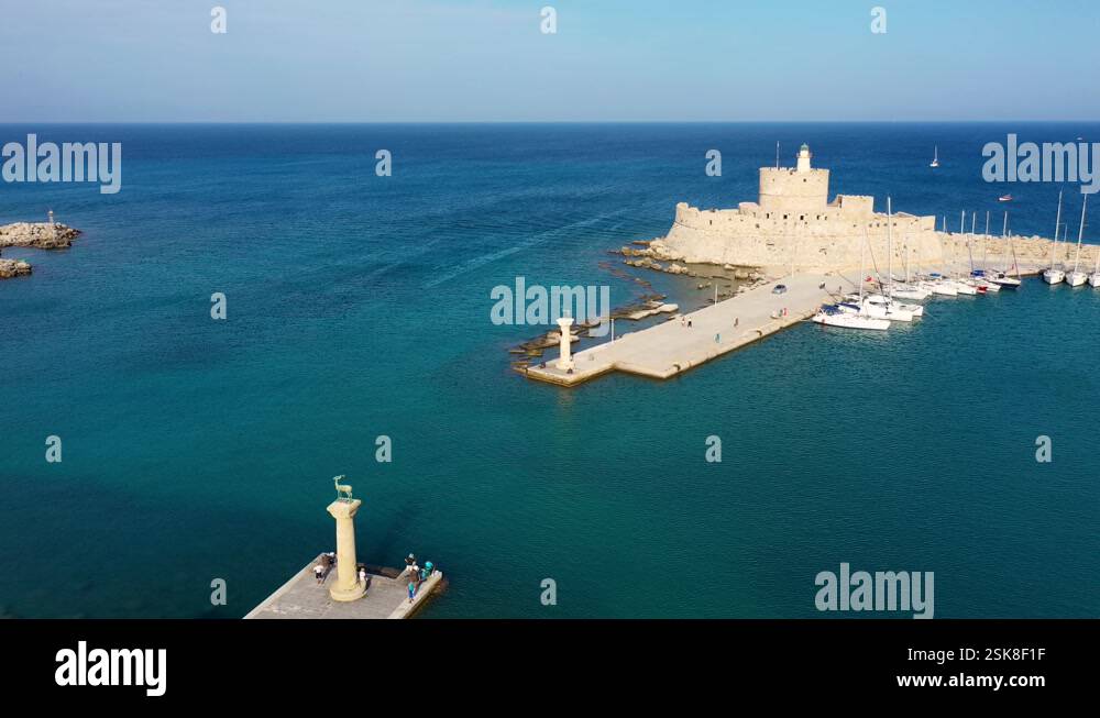 Mandraki port with deers statue, where The Colossus was standing and ...