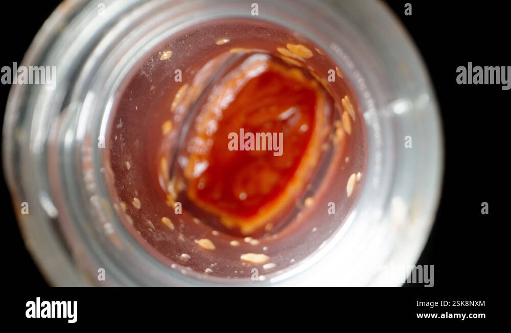 The top-down view shows me unscrewing the lid, and the camera descends ...