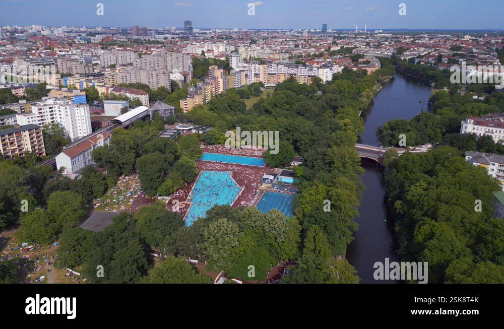 Magic aerial top view flight public swimming pool Prinzenbad, city ...