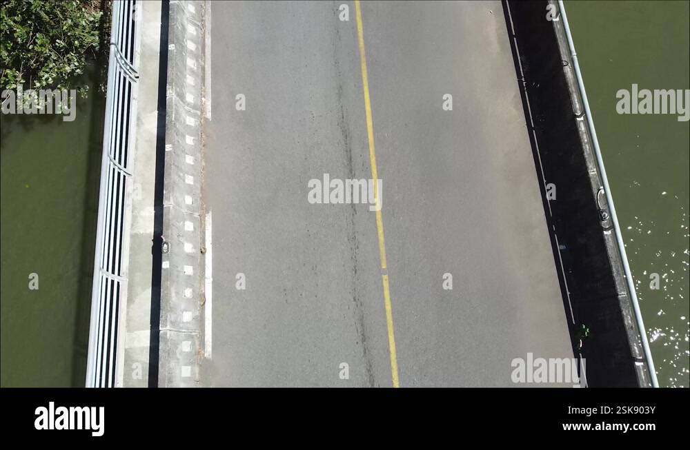 long cement bridge over reservoir in costa rica, aerial video Stock ...