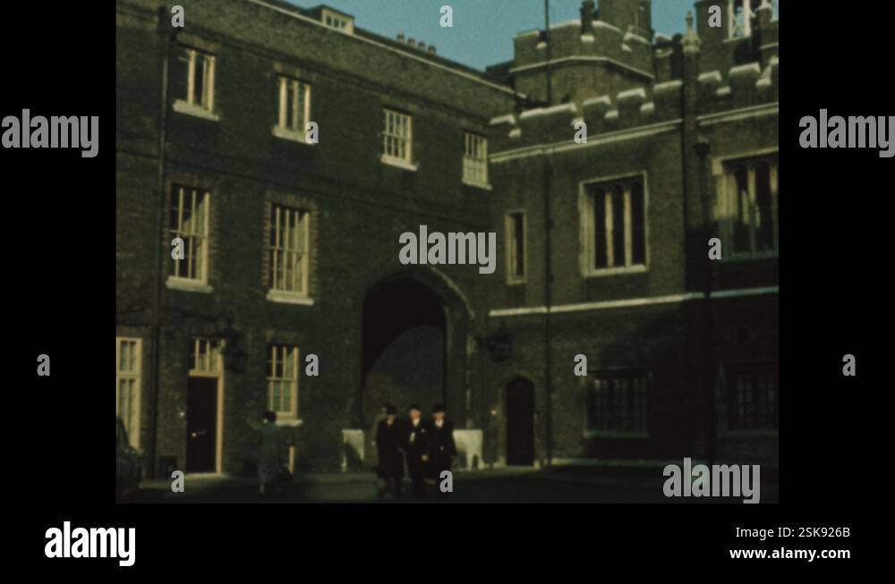 1960s: Building with unique architectural design, people walk in and ...