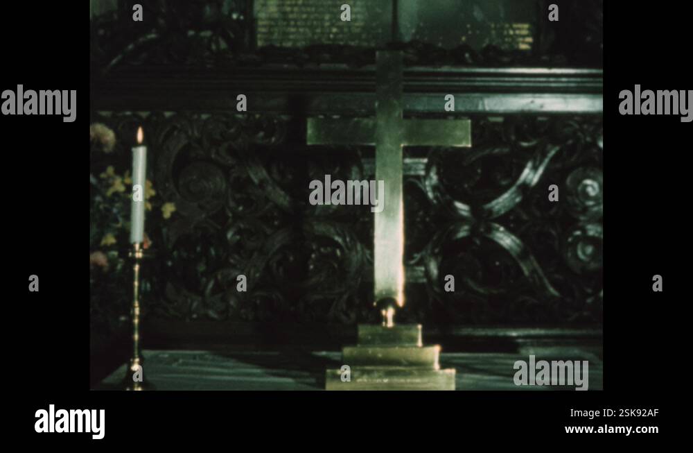 1960s: Gold cross with candles on both sides on altar Stock Video ...