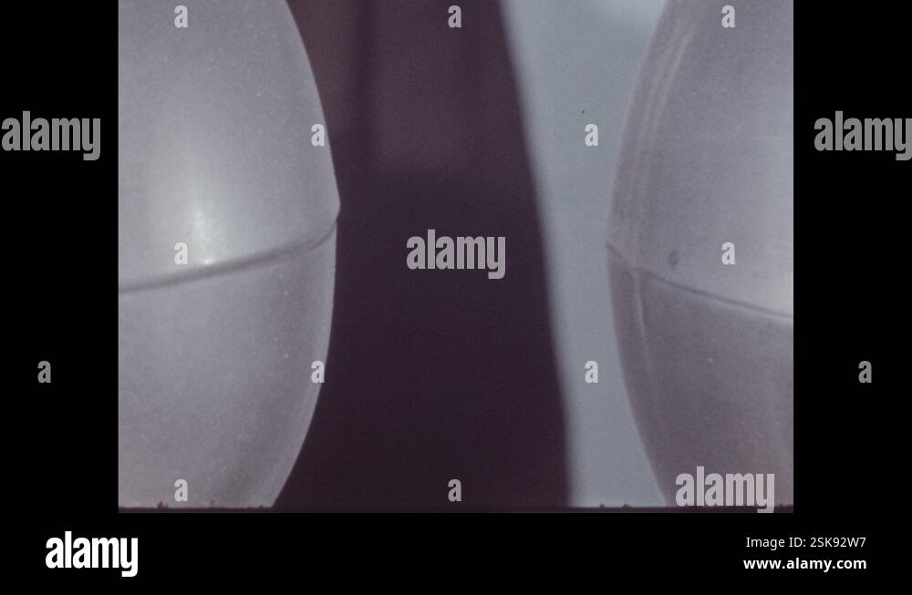 1960s: Spark jumping between two metal spheres Stock Video Footage - Alamy