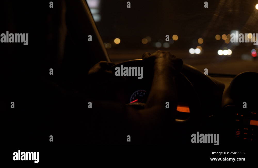Interior of Taxi cab driving at night time on busy highway in Dubai ...