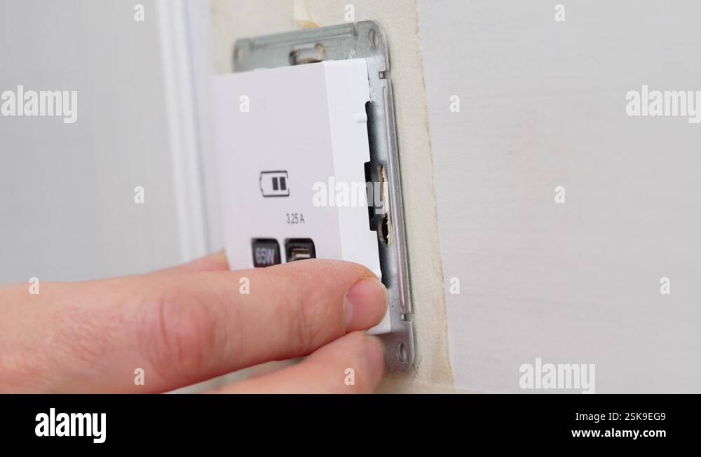 Installation of a USB Type-C socket at the head of the bed for charging ...