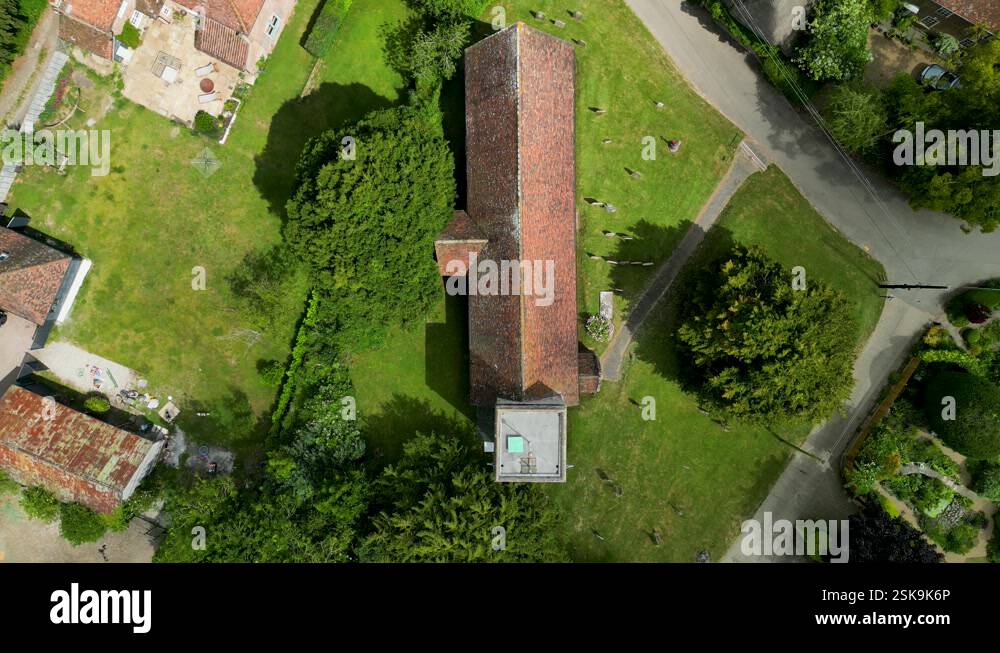 A top-down push-in shot towards the top of St Margaret of Antioch ...