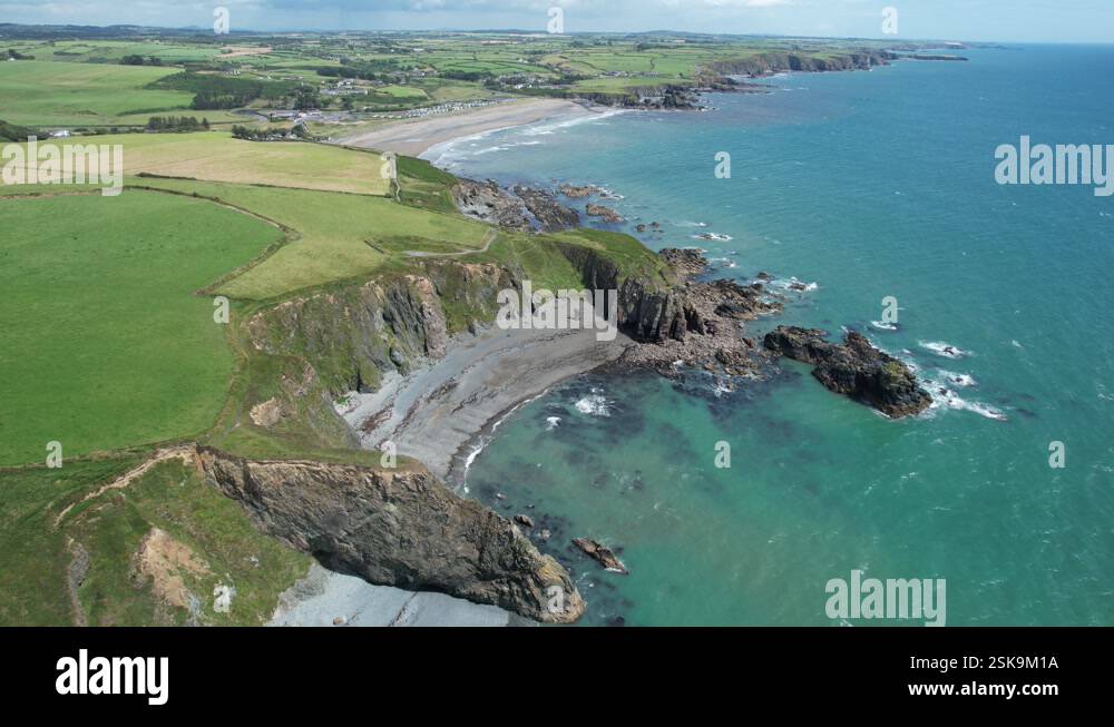 Looking back along the Copper Coast Waterford Ireland Tra Na NBno Beach ...