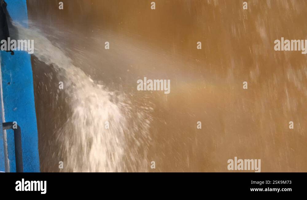 close up shot of water drainage from boat scupper or pipe, ship ...