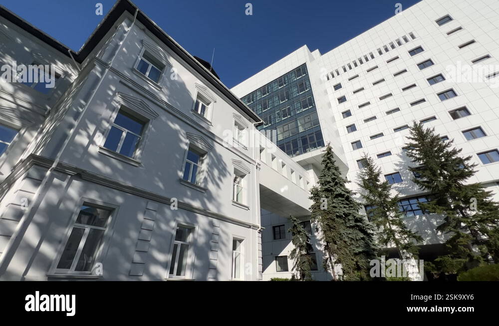 Hospital building exterior. Bottom up view of the clinic windows. Low ...