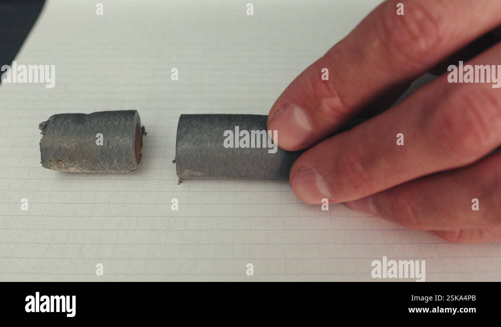 Cutting Two-Component Adhesive: Young Man Handling Adhesive Putty Stock ...