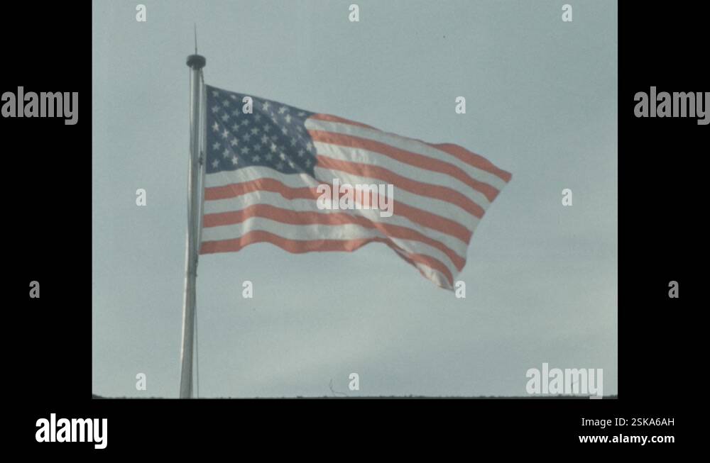 1960s: American flag waves in the breeze Stock Video Footage - Alamy