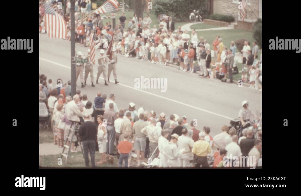 1960s: Spectators watch parade Stock Video Footage - Alamy