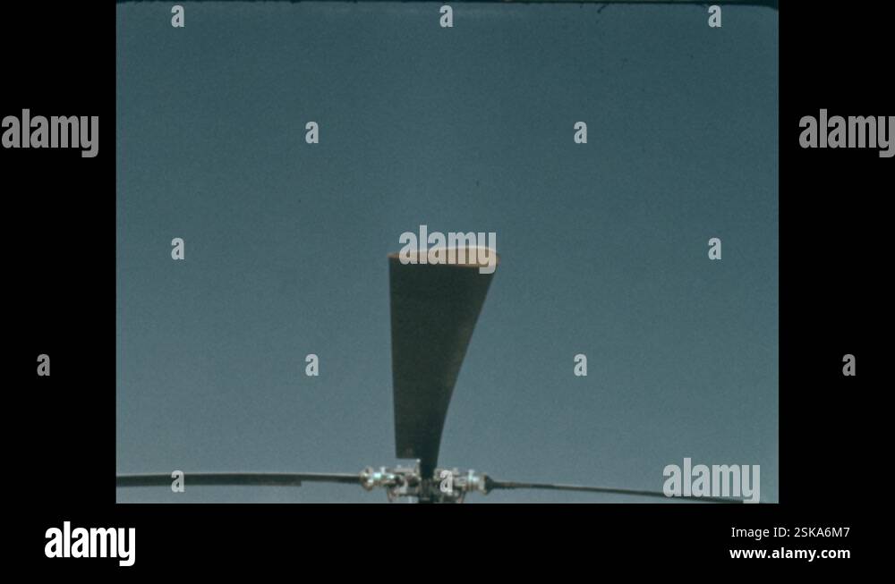 1960s: Rotor blades hang on engine of helicopter Stock Video Footage ...