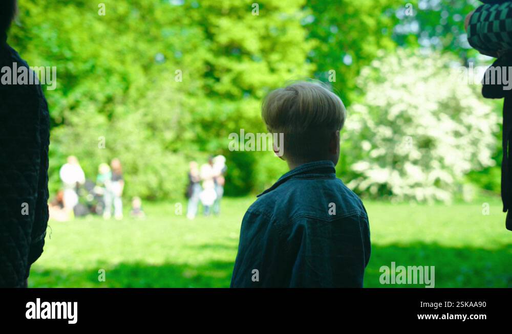 Join the whimsical world of a 4-year-old boy waiting in line with his ...