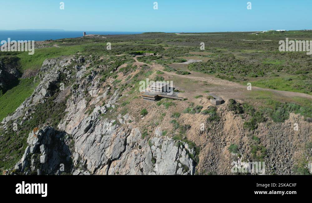pull back drone aerial reverse reveal cliff top German bunkers Channel ...