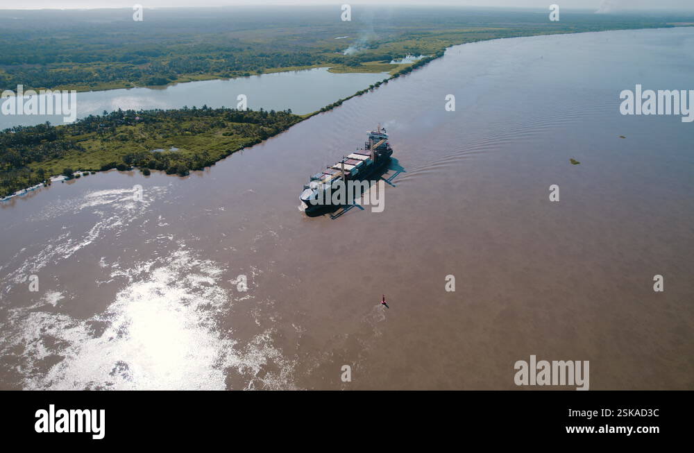 big ship gracefully sails along the Malecon of the Magdalena River in ...