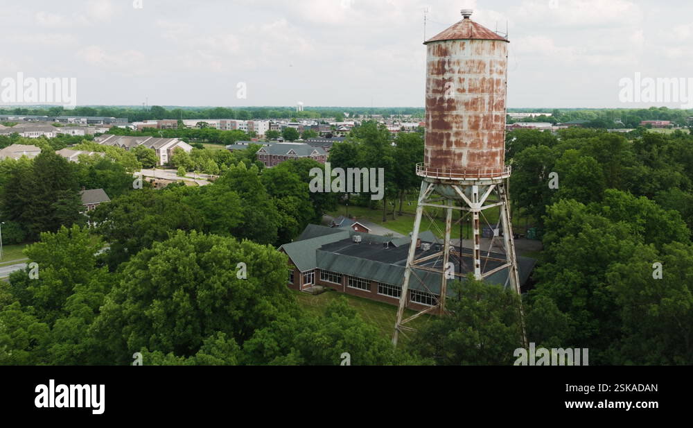 Establishing aerial of old water tower rising in Fort Harrison park in Stock Video Footage - Alamy