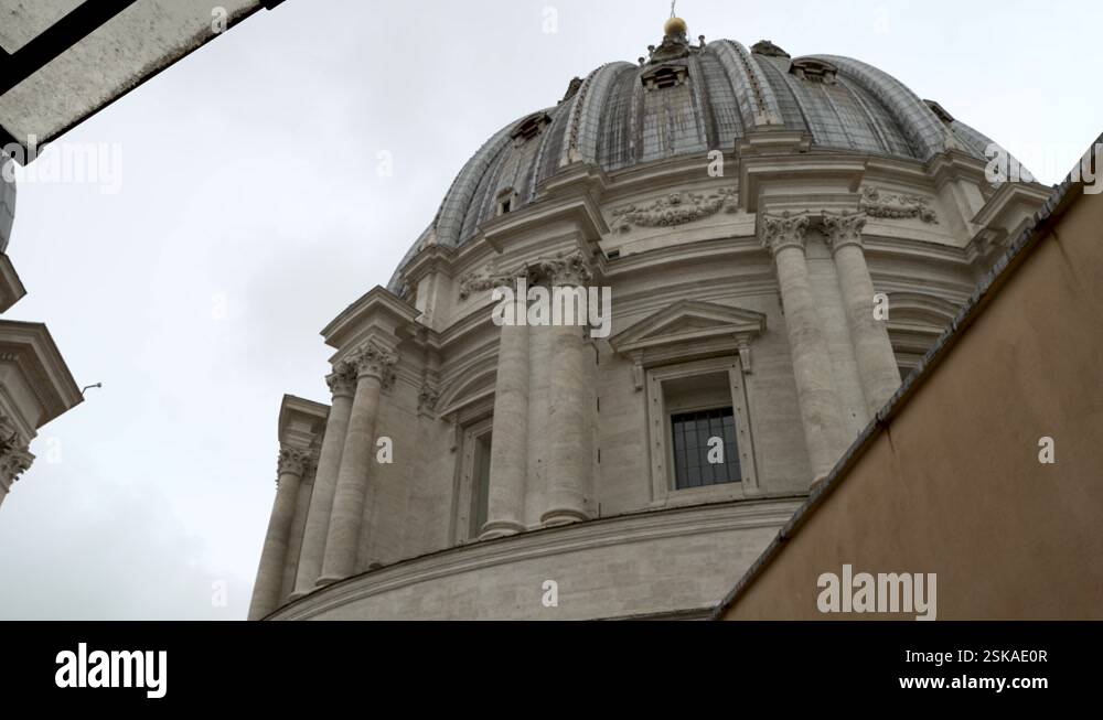 Looking Up At Dome Façade Of St. Peter's Basilica In The Vatican. Slow ...