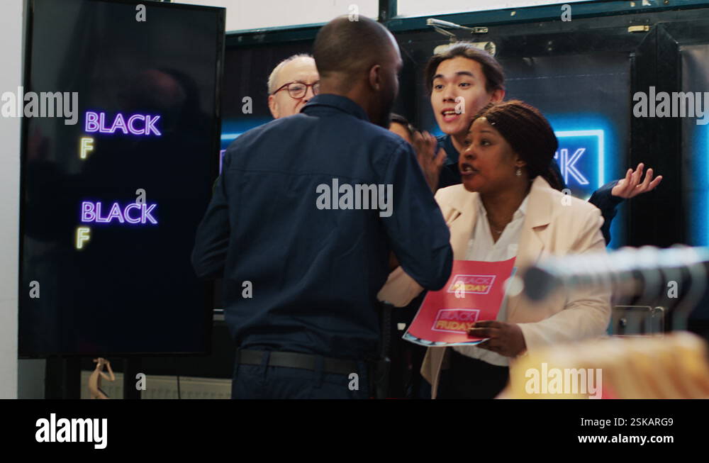 Angry clients pushing security guard Stock Video Footage - Alamy