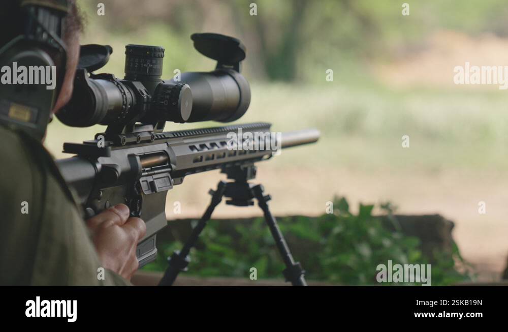 Sniper Soldier Firing An ArmaLite AR-10 Calibre 7.62mm At The Firing Stock Video Footage - Alamy