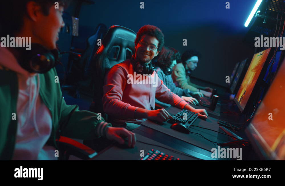Two Diverse Team Mates Winning FPS Competition and Bumping Fists Stock ...
