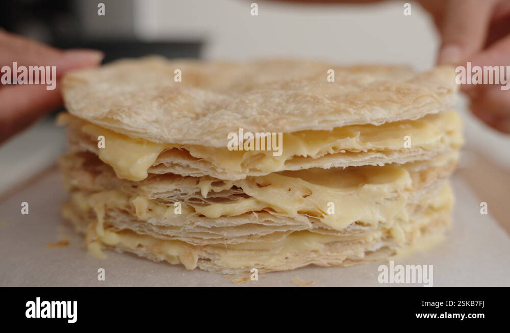 I am layering the puff pastry on top of each other, creating a Napoleon ...