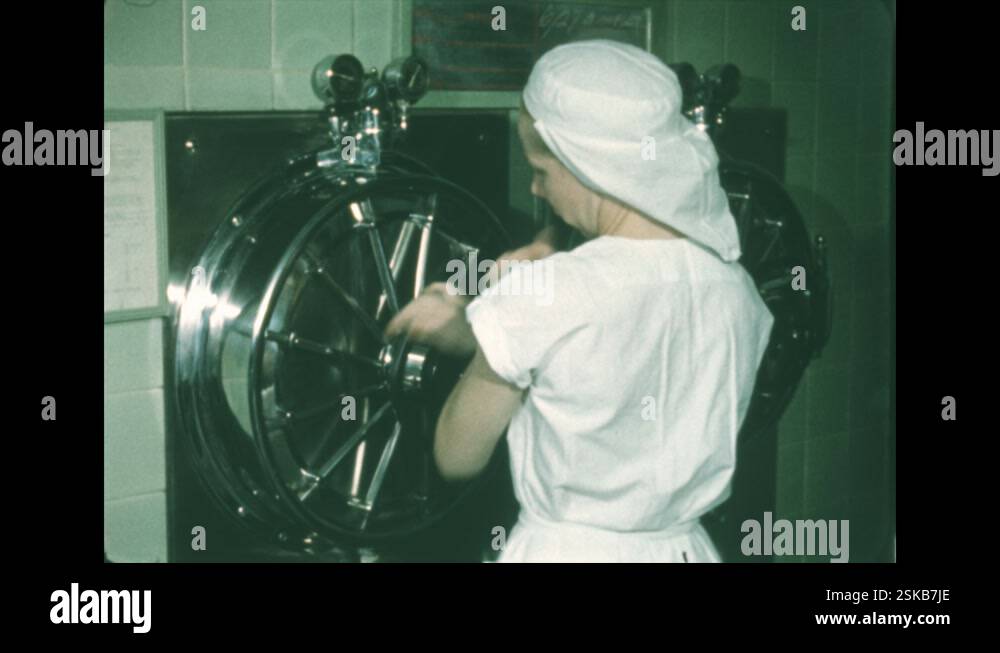 1960s: Nurse places bundle of medical instruments in autoclave and ...