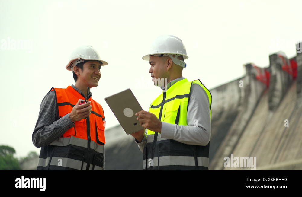 Confident asian two engineers man inspection with in tablet at ...