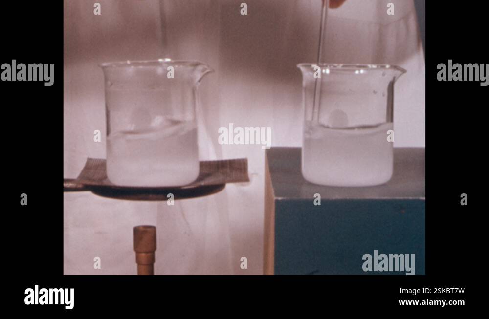 1960s: Two beakers of water: one on Bunsen burner, and the other on ...
