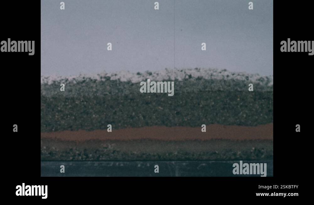 1960s: Stratified levels of dirt and aggregate sit on display in cross ...