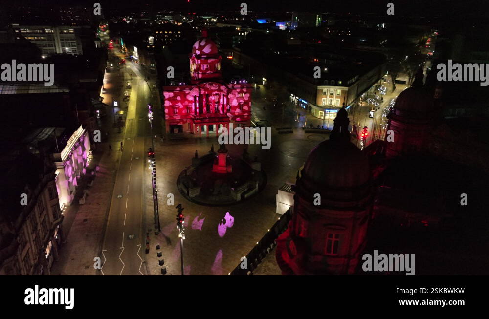 Fly around of Hull's Queen Victoria Square showing night time ...
