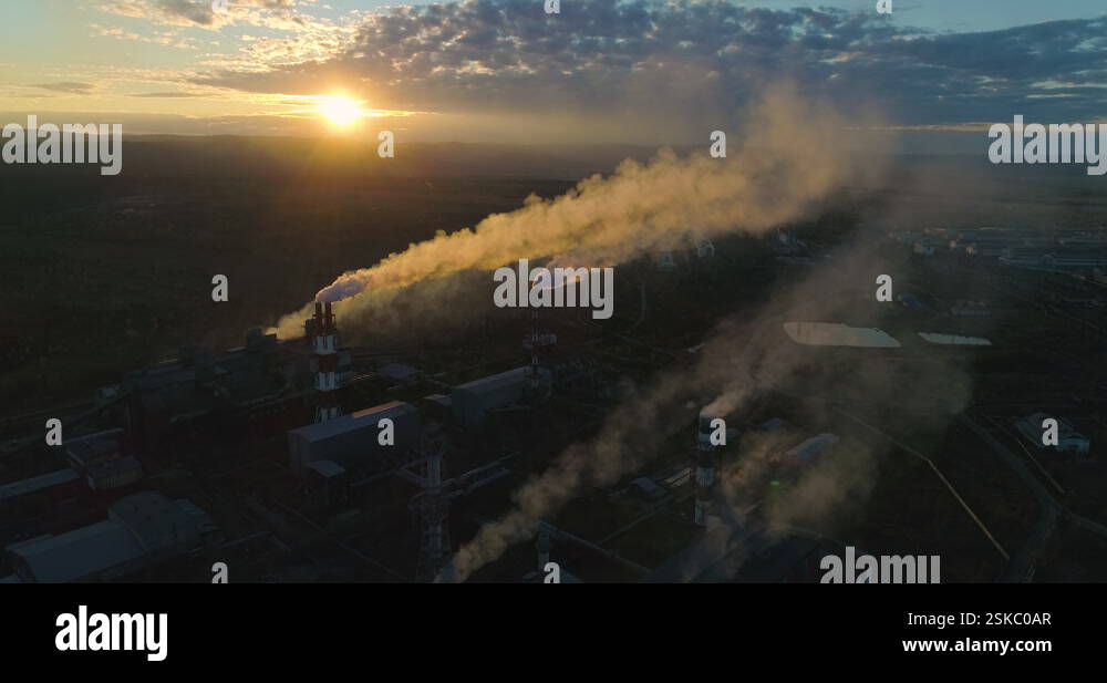 Factory Smokestack Spewing Out a Stream of Smoke. Plant Pipes Pollute ...
