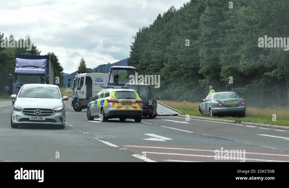 Serious car crash on a Scottish road with a police investigating the ...