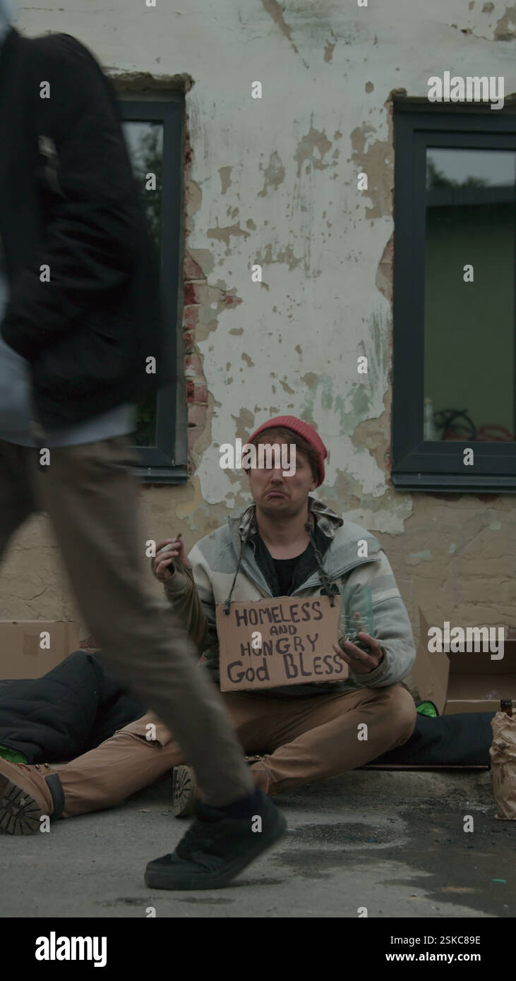 Homeless man sign money Stock Videos & Footage - HD and 4K Video Clips ...