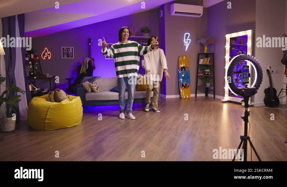 Two Gen Z Asian friends K-pop dancers record trending reels for social ...