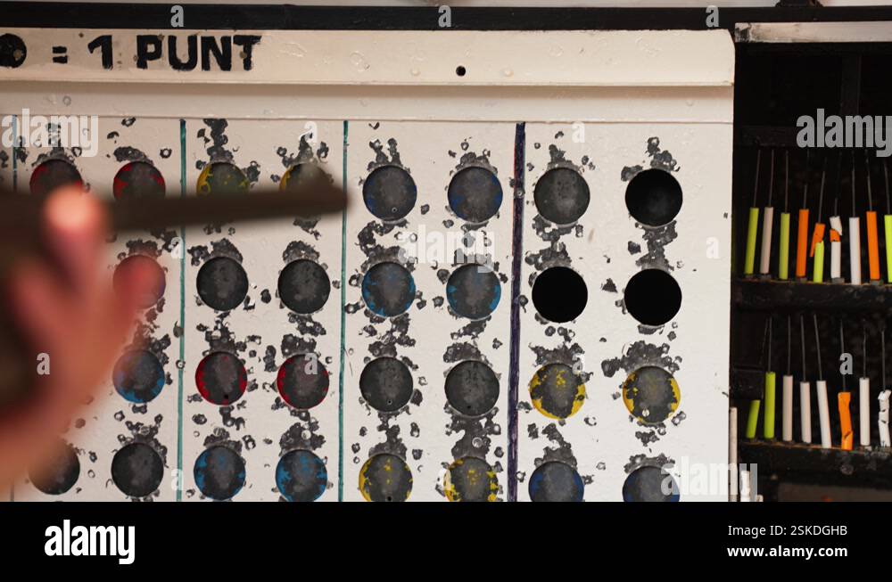 POV of person shooting and hitting the target with a gun at the fun ...