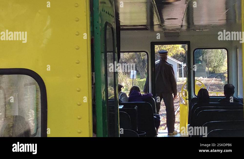 Locomotive Moving Forward With Train Conductor Standing In Front Of ...
