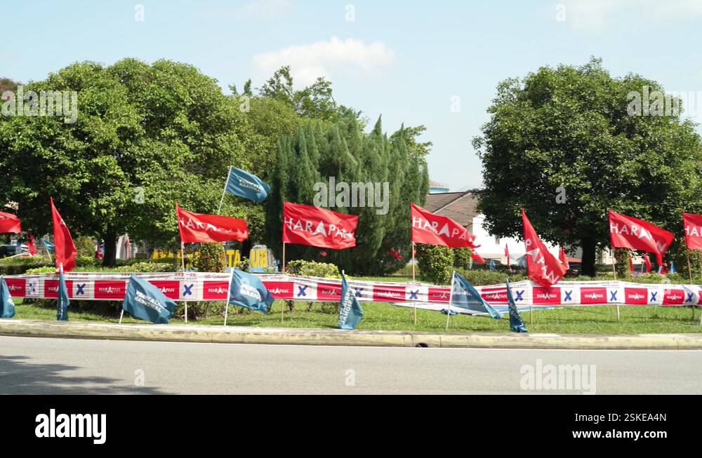 Political party flags waving along the roundabout in Ampang Stock Video ...