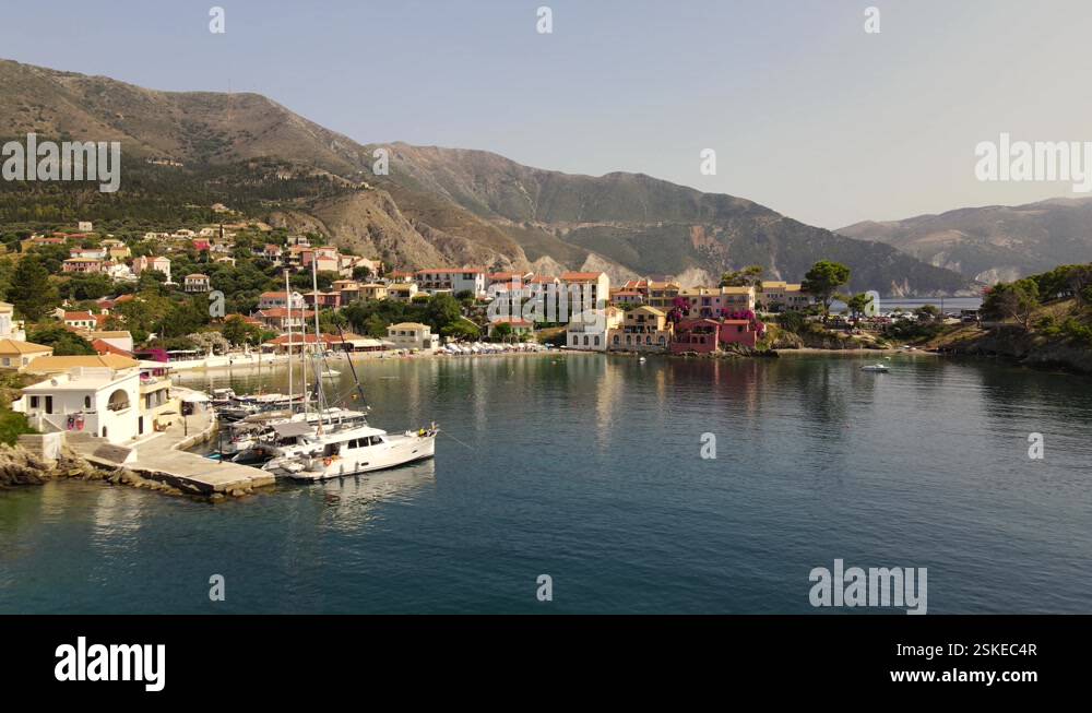 Famous colorful houses on beach Asos in Kefalonia, Greece, aerial ...