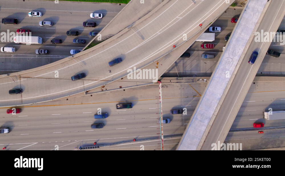 Heavy traffic at roads and highways during the day. Directly from above ...