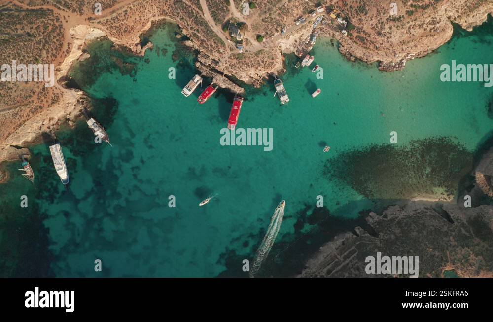 Bird's eye drone view of Malta's breathtaking Blue Lagoon, renowned for ...
