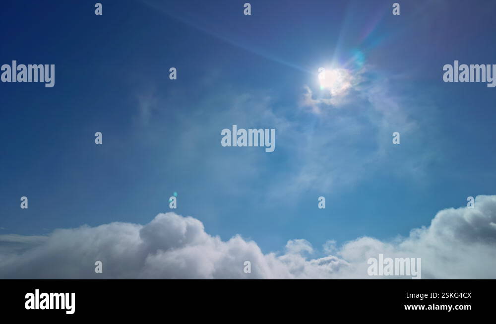 Bright sunlight behind clouds sunny Stock Videos & Footage - HD and 4K ...