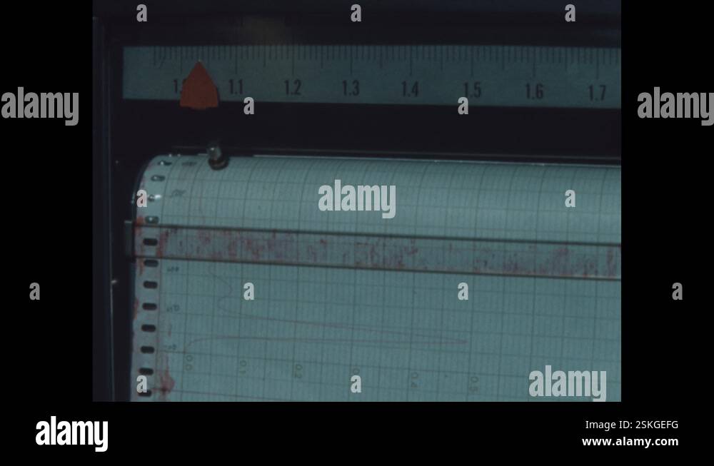 1960s: Arrow slides across top of paper in graph instrument printer ...