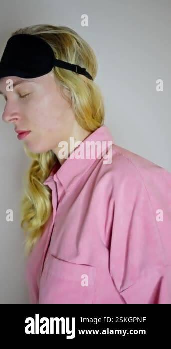 Vertical Screen: exhausted European girl falling back to keep sleeping ...