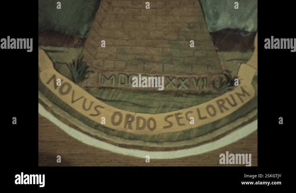 1960s: Hand points to Roman numerals and Latin words on base of the ...