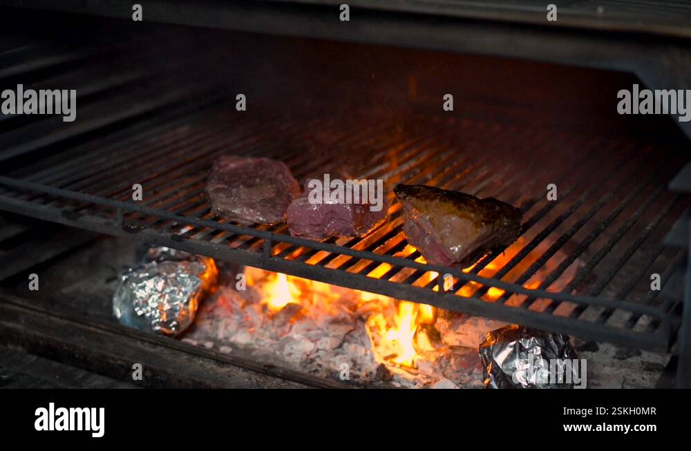 Picanha and top sirloin steak beef american over grid grill charcoal ...
