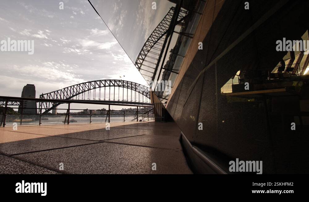 Opera House window reflects Sydney Harbour Bridge dolly 4K Stock Video ...